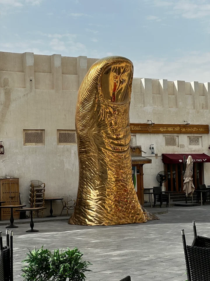 The Golden Thumb Statue in Doha | What to Know Before You Go